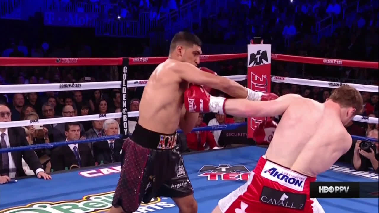 Amir Khan lands a right hand on Canelo