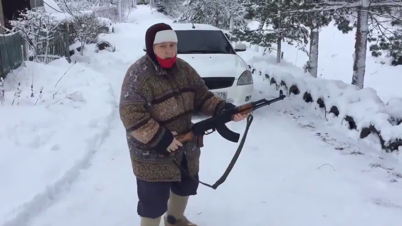 Babushka testing out an AK-47