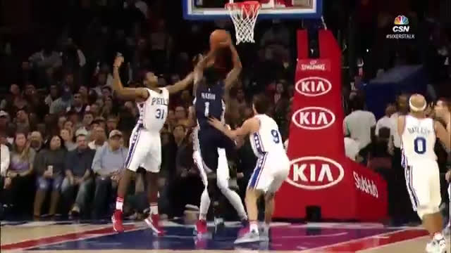 Embiid with the monster block