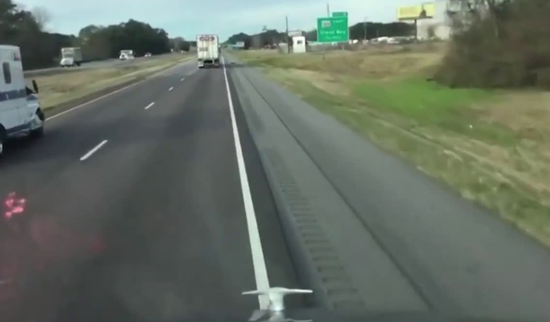 Road rage truck driver runs an ambulance and cars off the road
