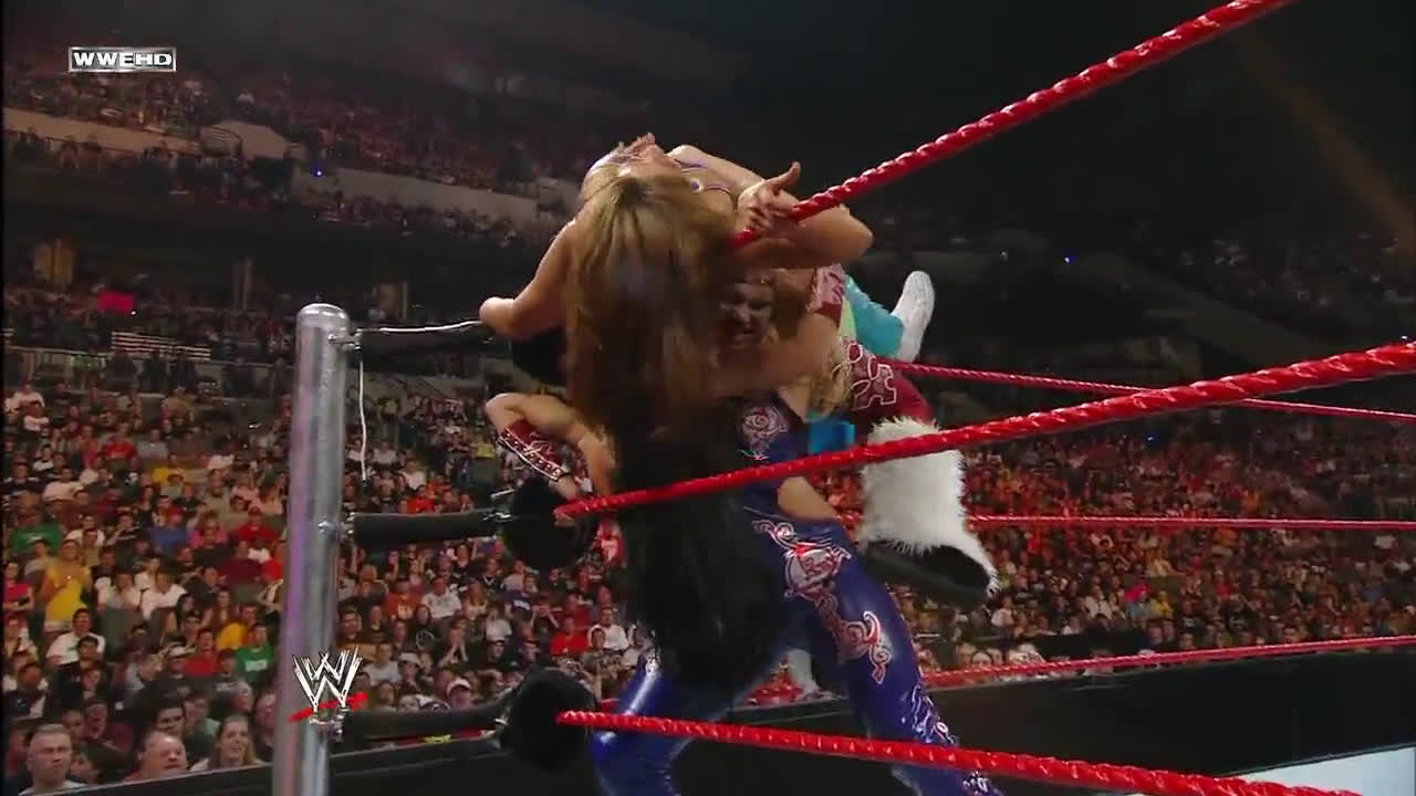 Beth Phoenix With A Double Canadian Backbreaker Rack