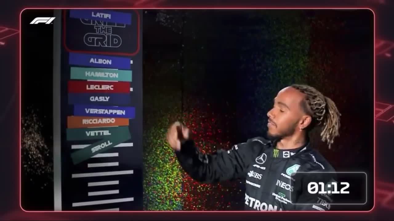 Lewis throwing Ocon