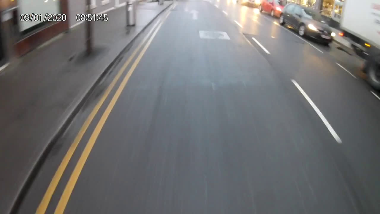 Car pulling out and blocking road