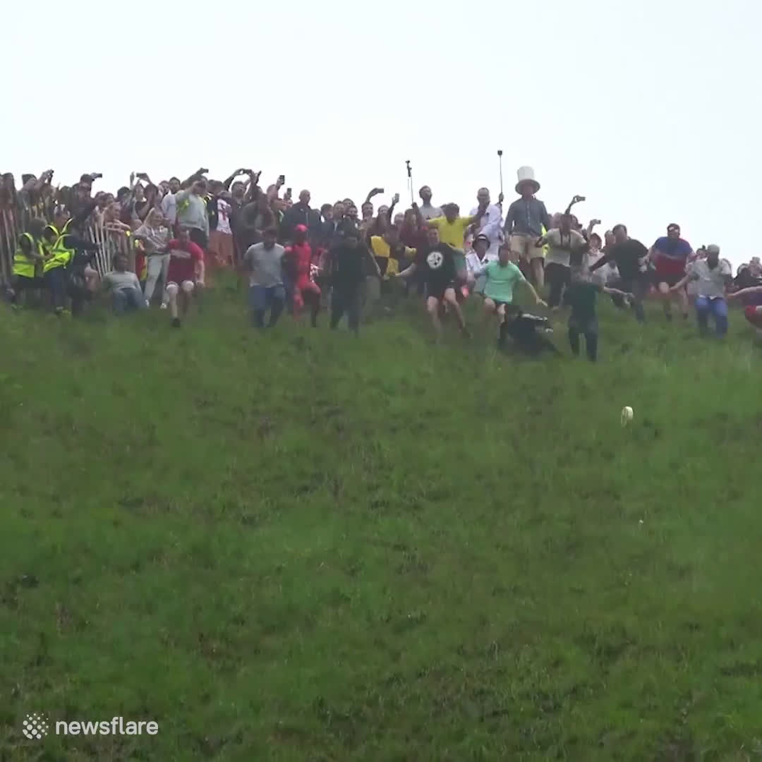 People falling down a hill, reversed