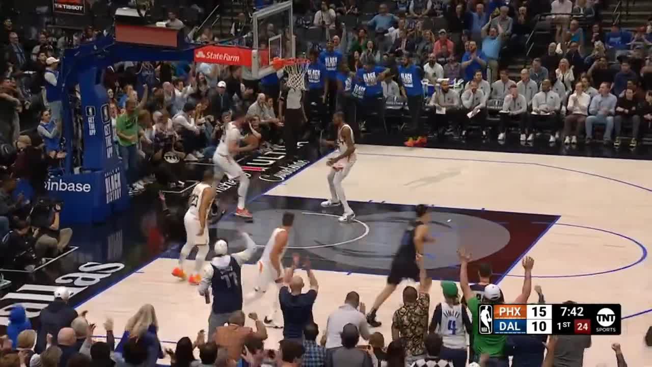 Watch Kyrie Irving filthy layup after switching hands mid-air has bench hyped vs Suns | Streamable