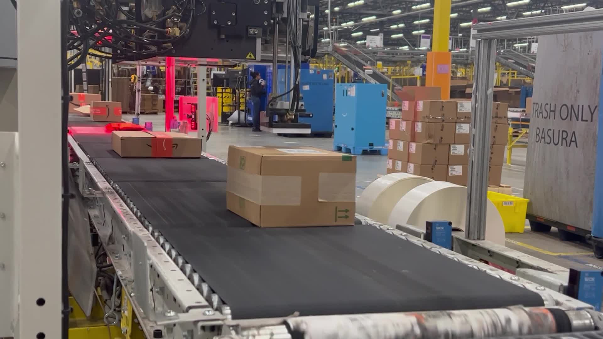 Amazon. Boxes on Conveyor