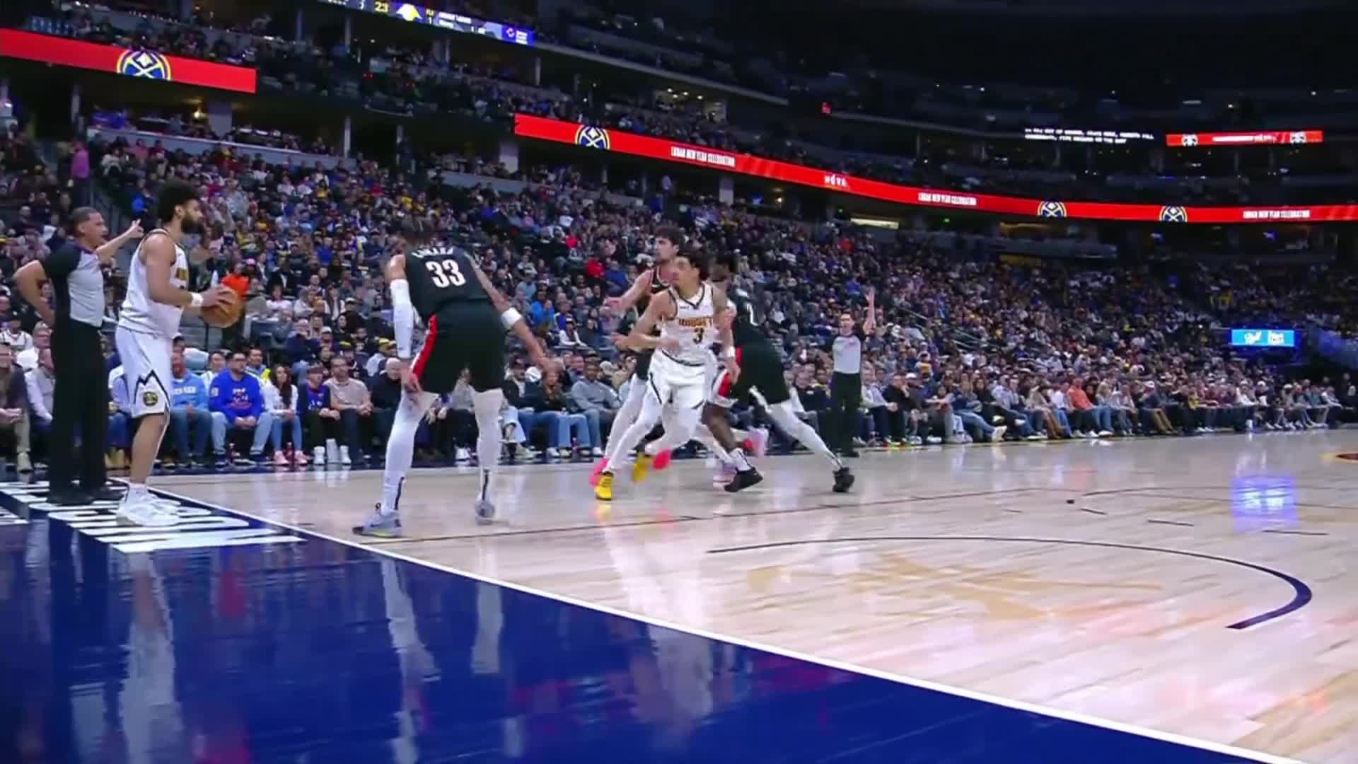Watch Jokic hits an absurd three from the very corner of the court | Streamable