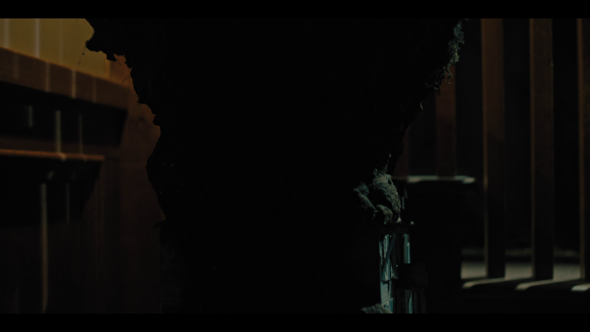 Hereditary – model house next to the stairs with several houses beneath