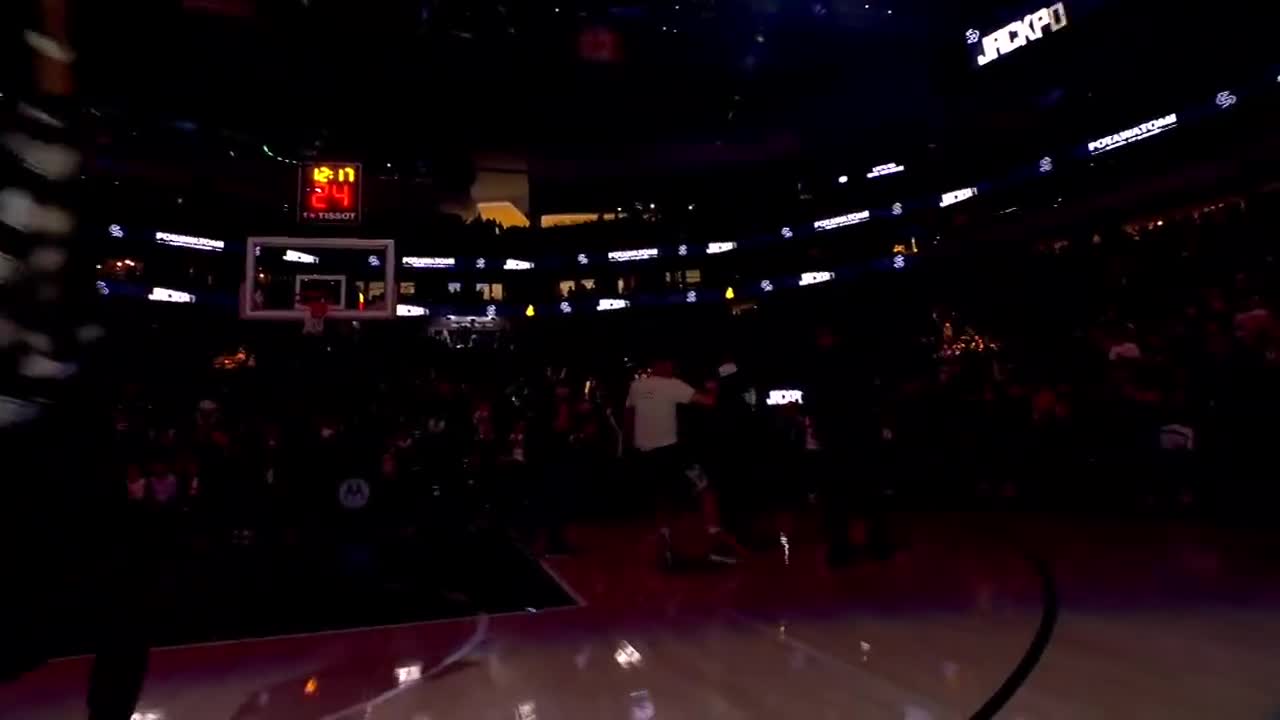 A Bucks fan in Milwaukee just cashed in a half-court shot for $10,000!