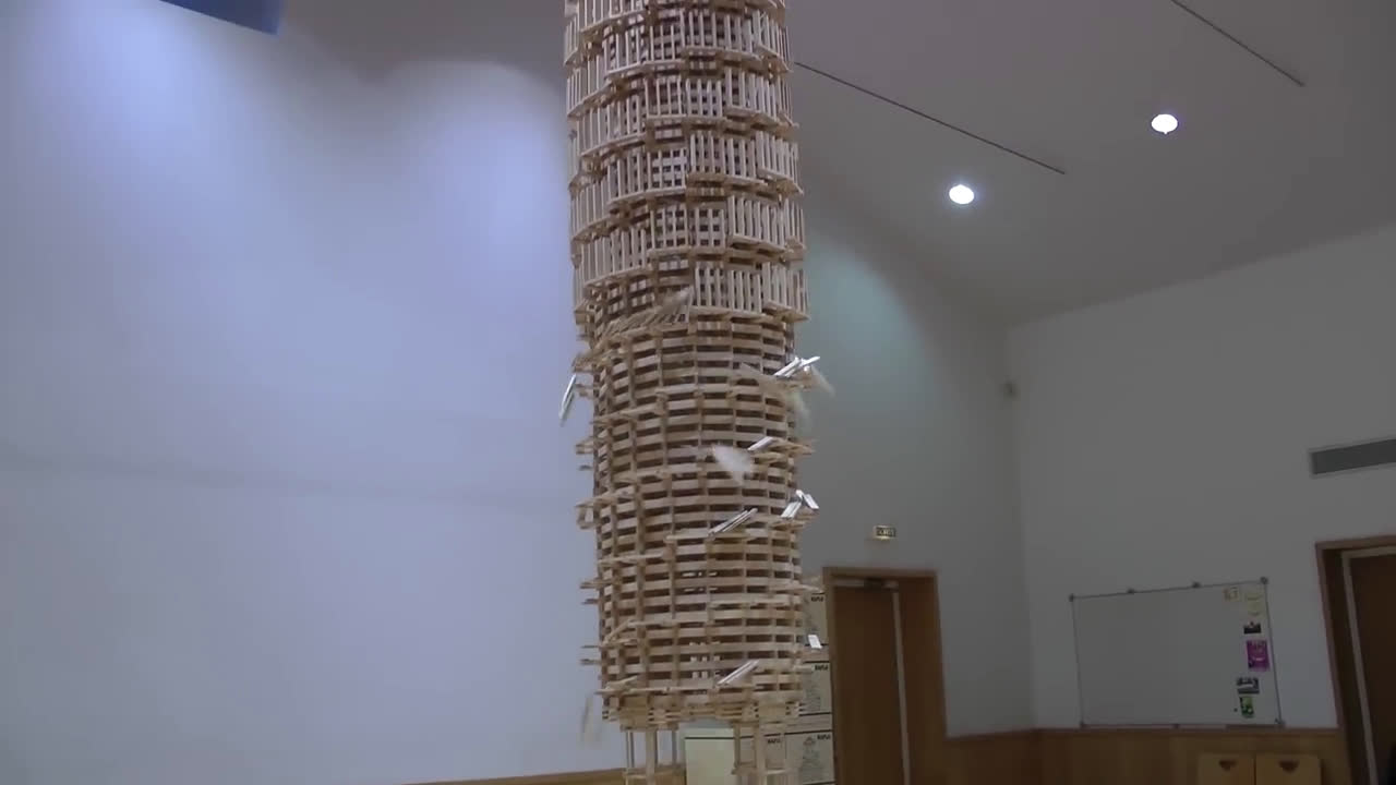 Self-collapsing kapla tower