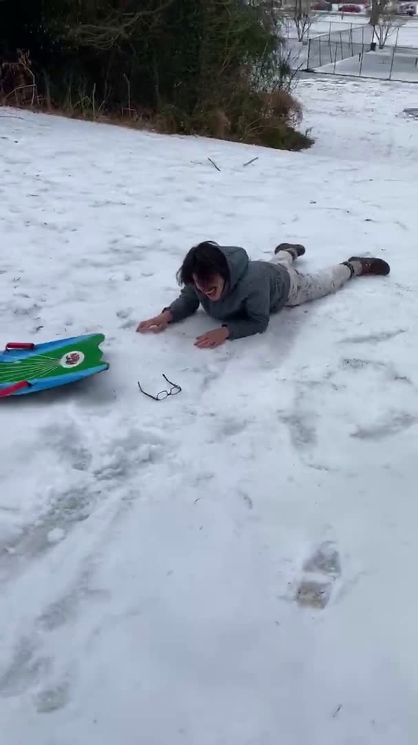 Attempting to go sledding