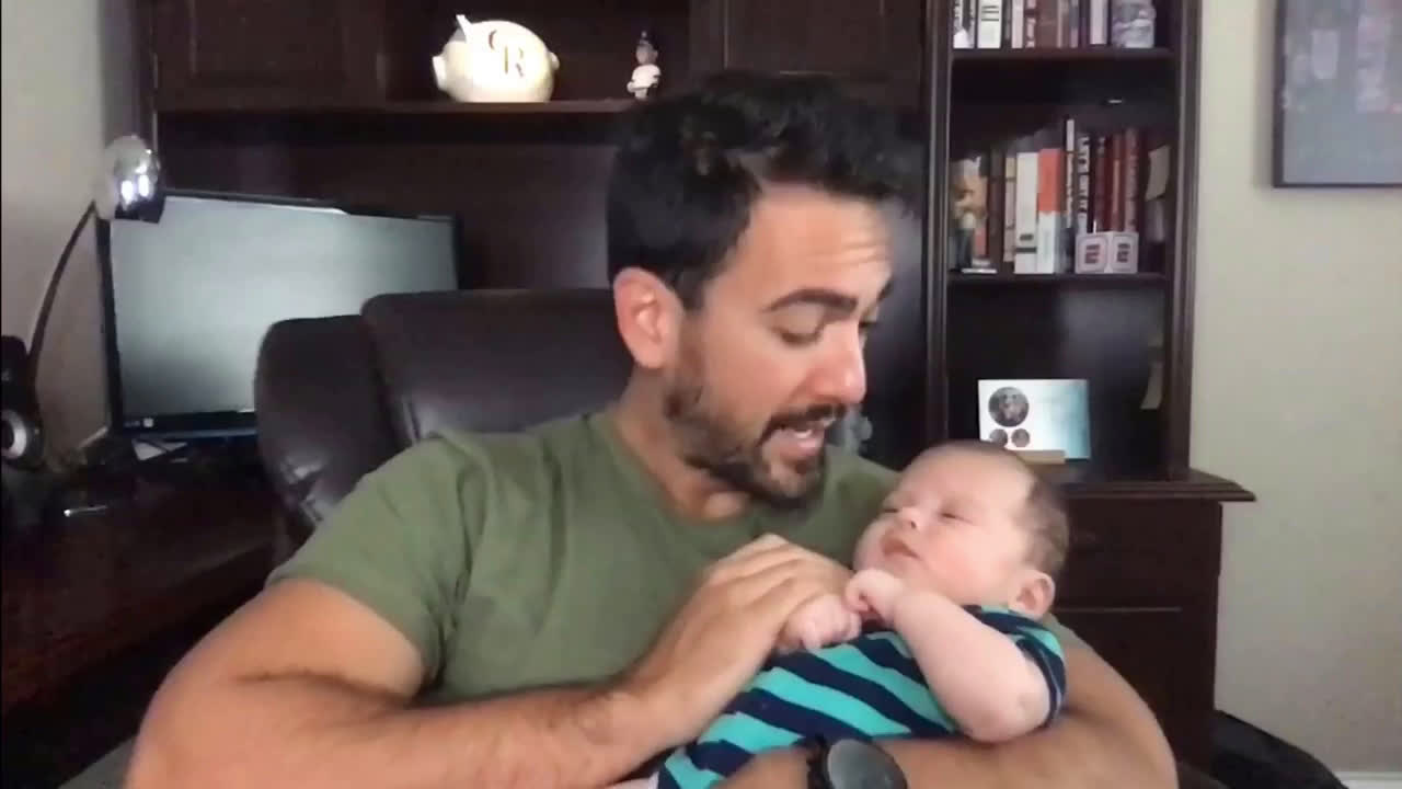 Brett Okamoto tells his son a bedtime story.