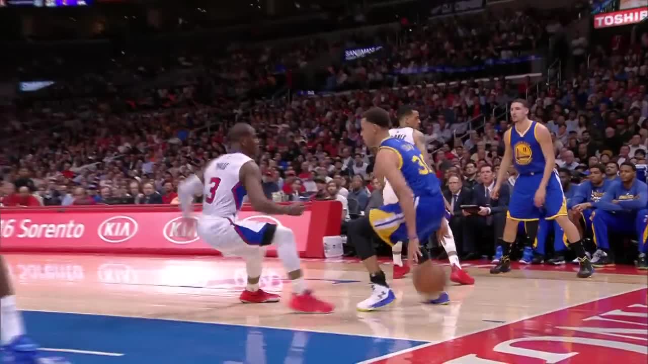 Steph Curry drops CP3 with the behind the back move (2015)