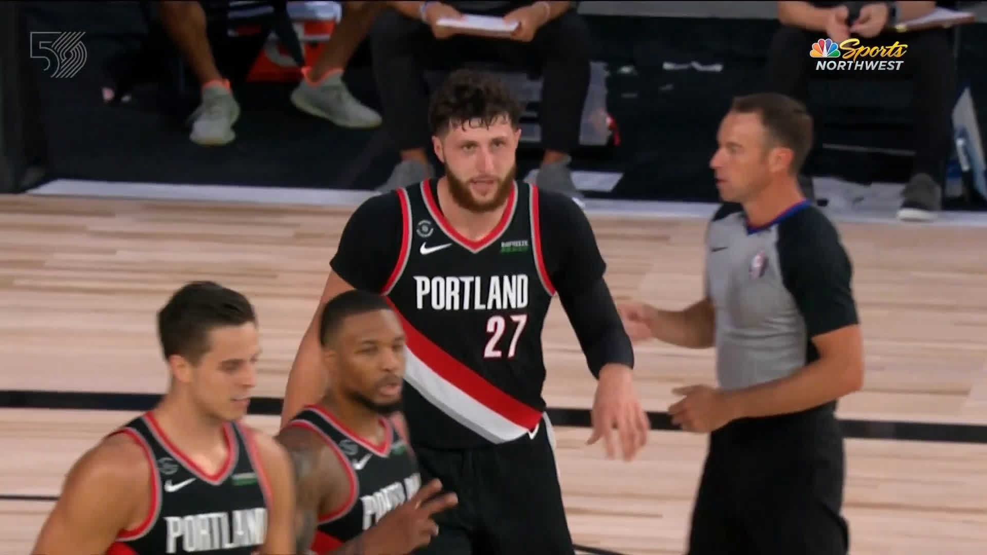 Collins meets MPJ and the rim and forces the jump ball