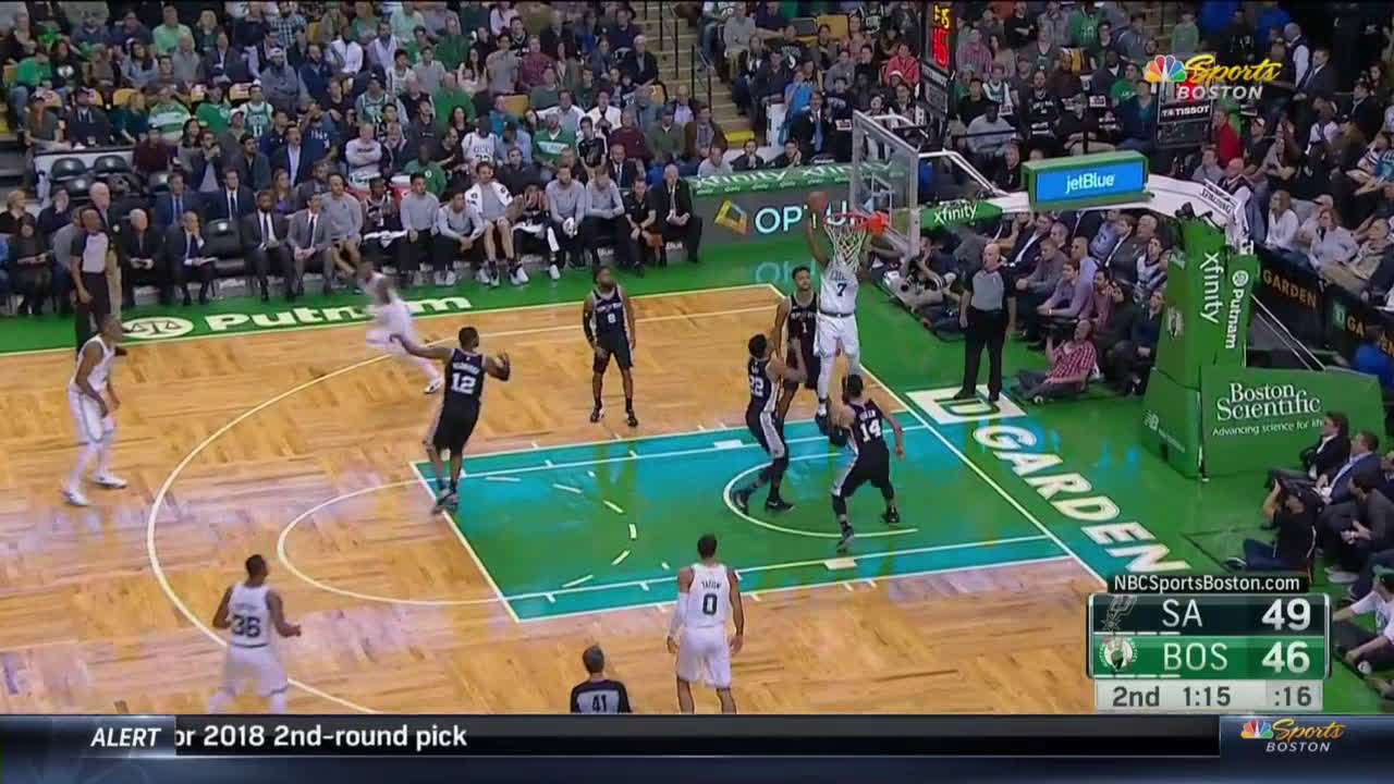 Kyrie spins in the post then finds Jaylen Brown with the one handed ...