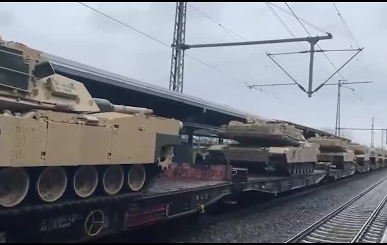 train_with_tanks_in_soest_germany_spotted_moving