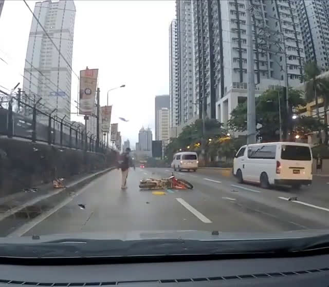 Motorcyclist almost gets run over by bus