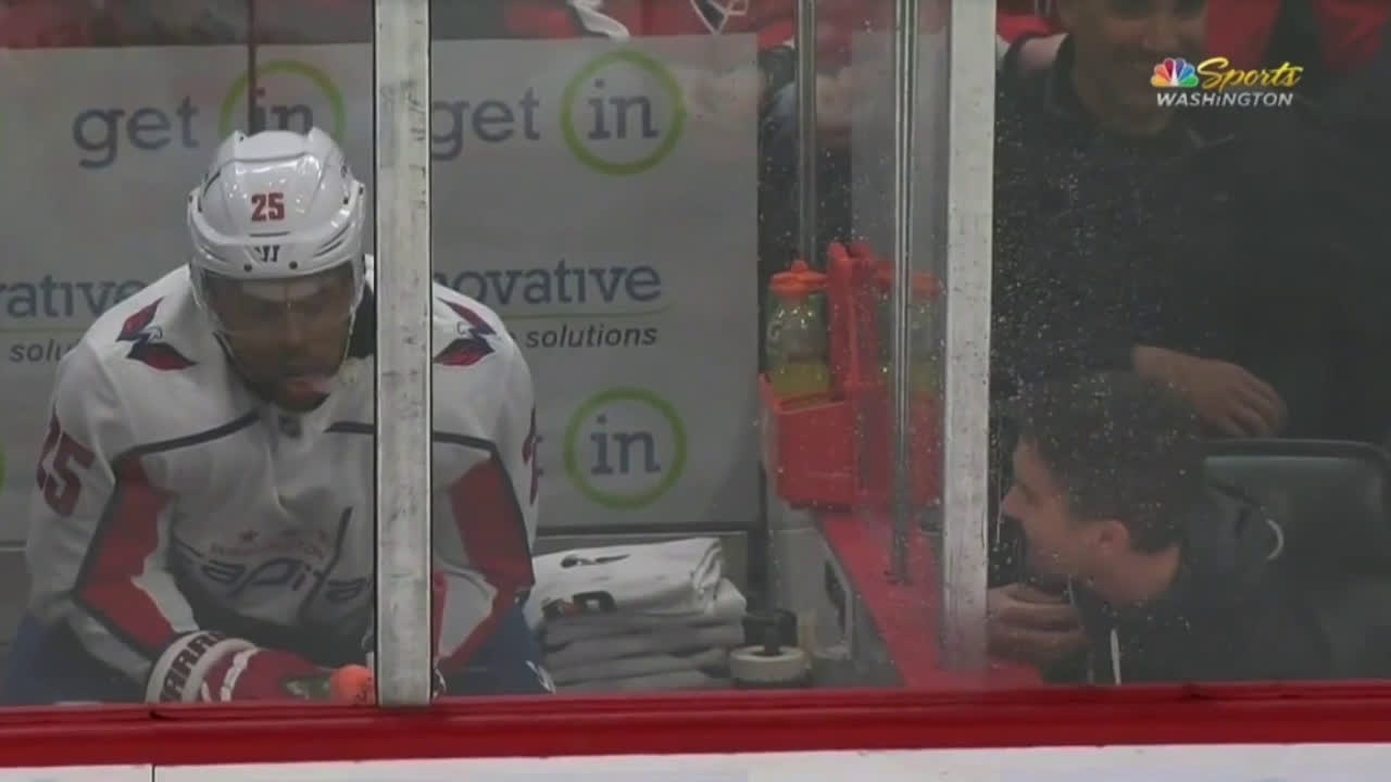 Devante Smith-Pelly drenches heckling fan from penalty box