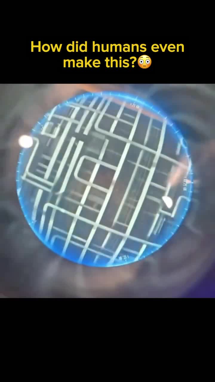 Watch An iPhone CPU under a microscope, with a hair strand for size ...