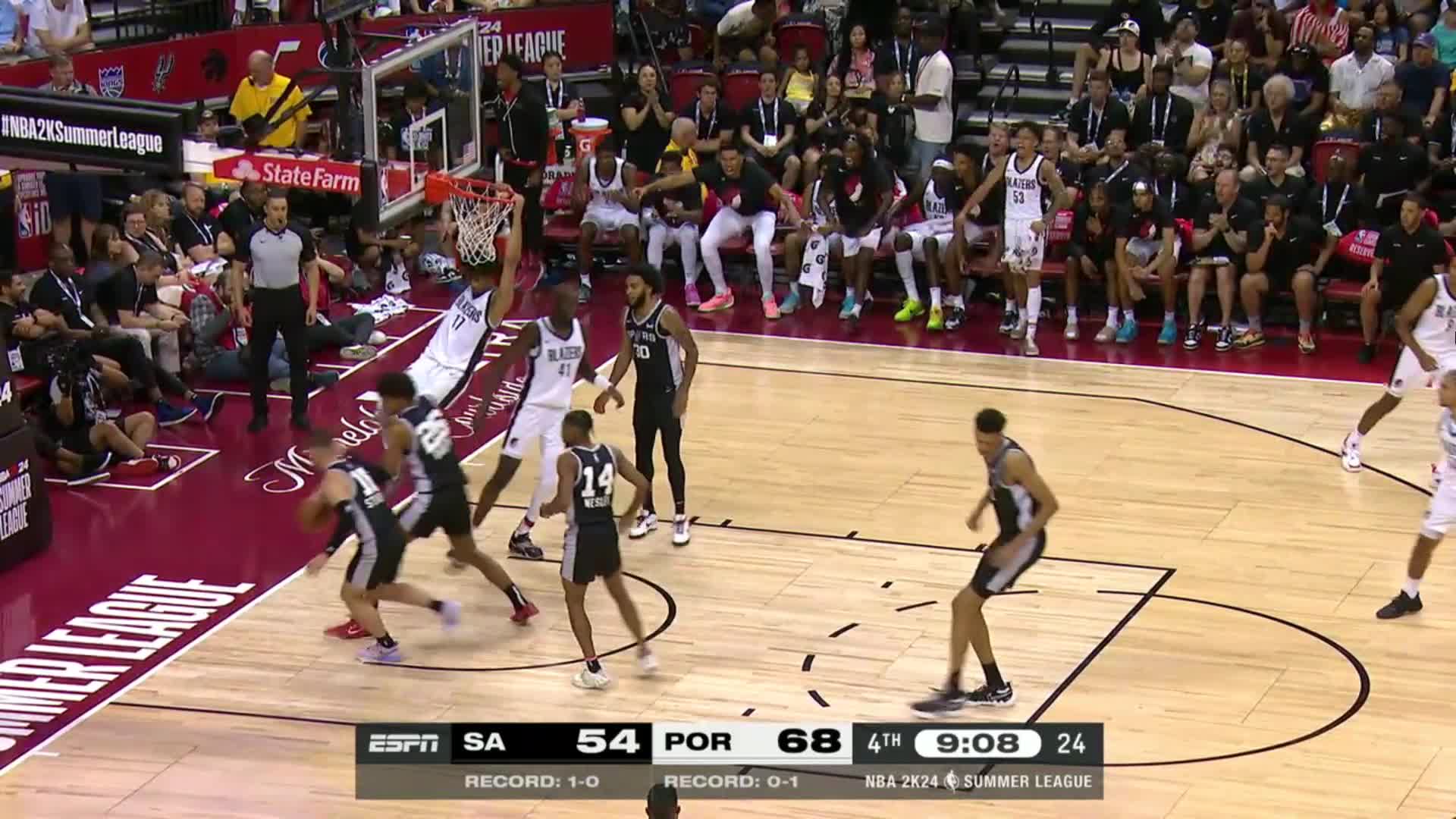 Sharpe explodes into the air for the twisting two-hand dunk