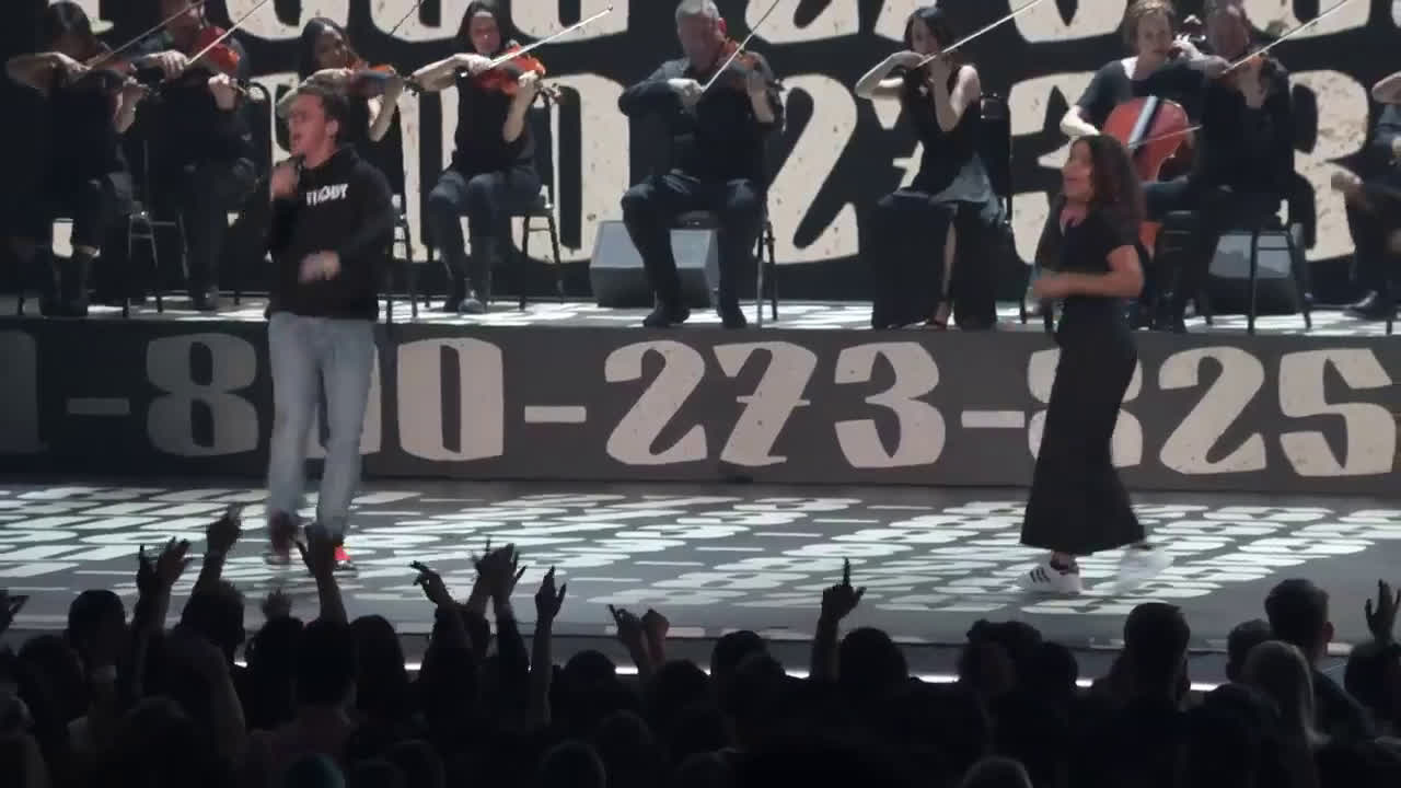 Logic performs 1-800-273-8255 at the