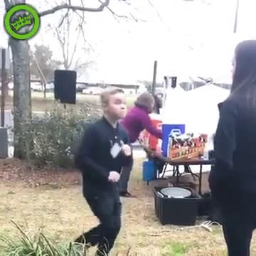 Kid trying to impress a girl with his dancemoves.