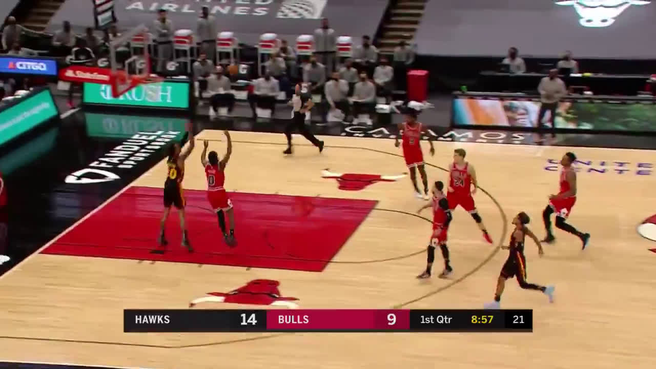 Watch Trae with the monster lob to John Collins who draws the and-1 | Streamable