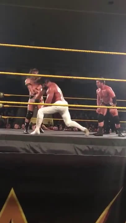 Andrade Palm Slap and Chop Adam Cole Roderick Strong