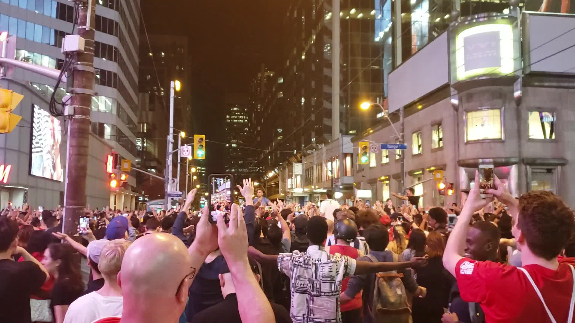 Toronto Raptors Fans celebrating by doing the Icelandic clap