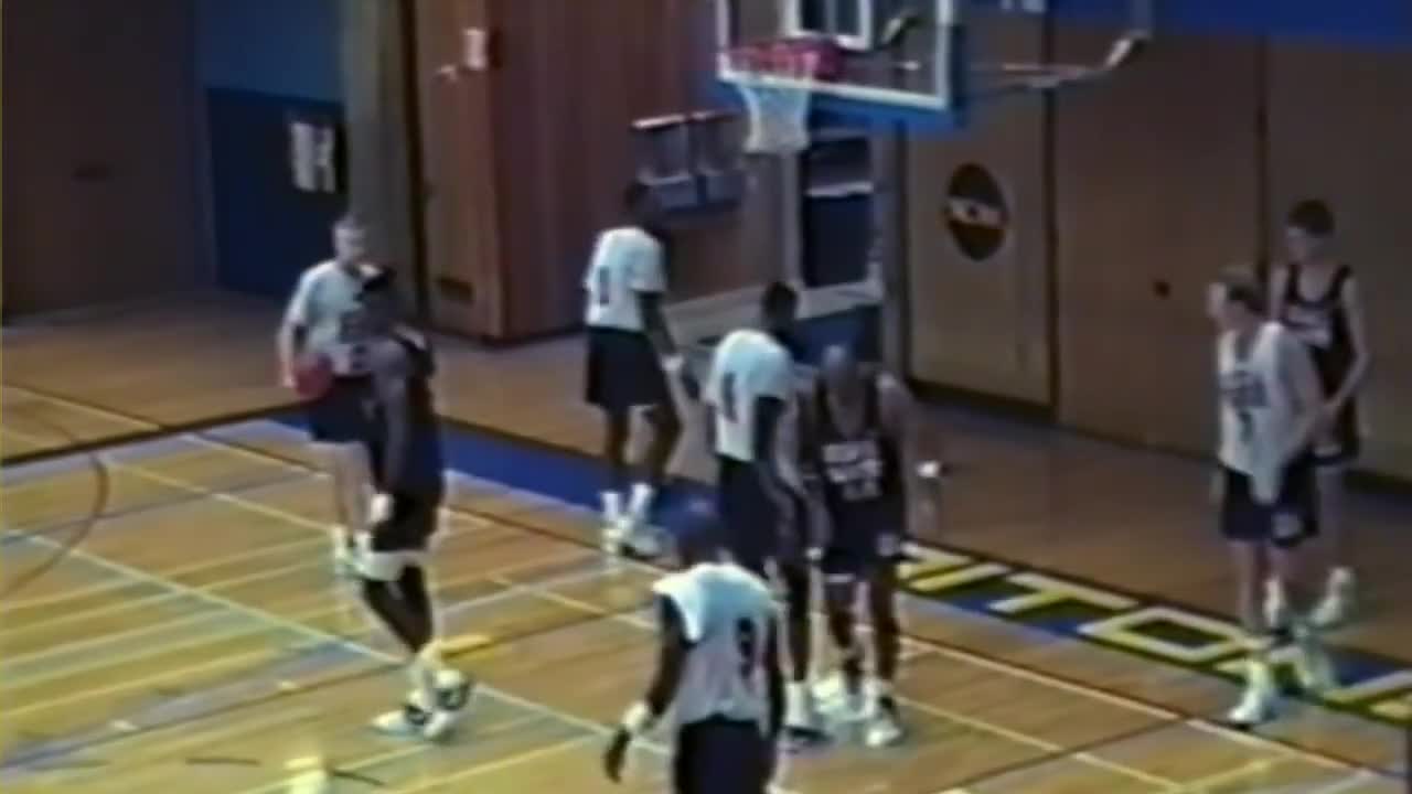 Charles Barkley dunking on Karl Malone in Dream Team practice
