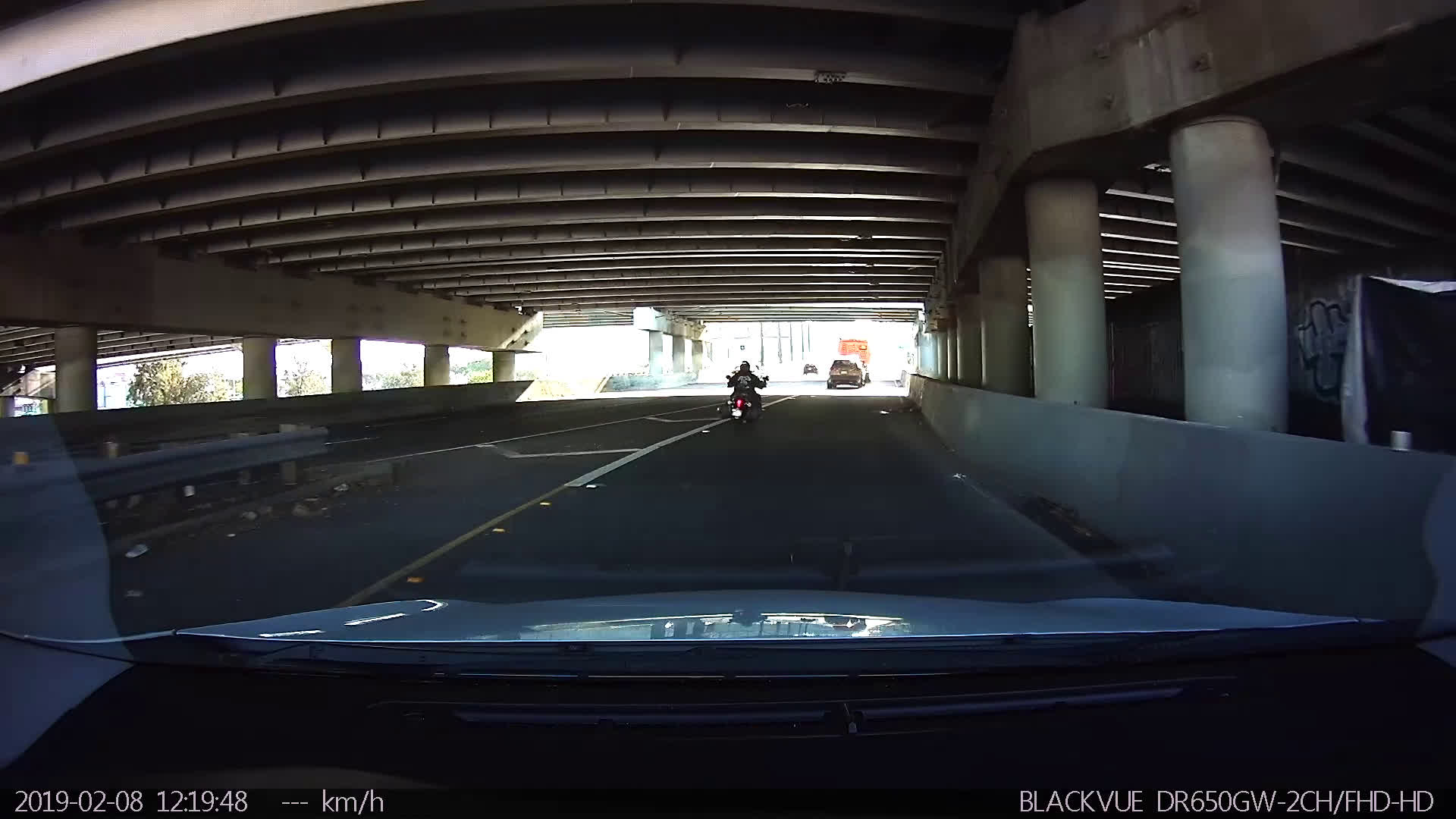 Car almost crashes into merging motorcycle