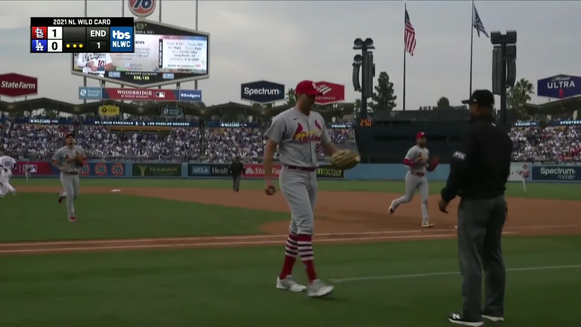 Adam Wainwright catches Justin Turner come-backer.