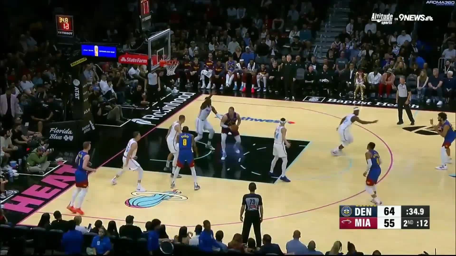 Watch [Highlight] Nikola Jokic posts up Bam Adebayo, backs him down, pumps, spins, and drops in ...