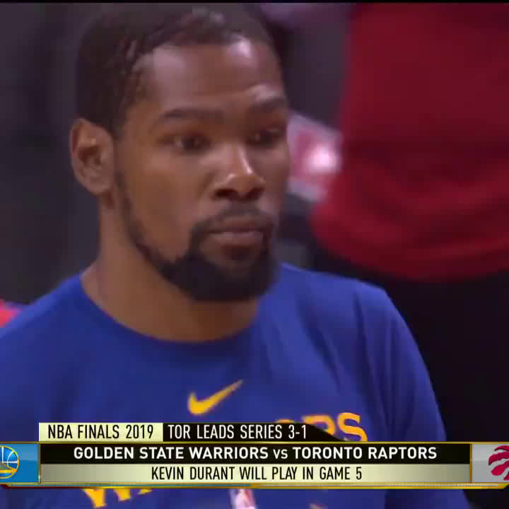 Kevin Durant is welcomed with boos as he makes his way to the court